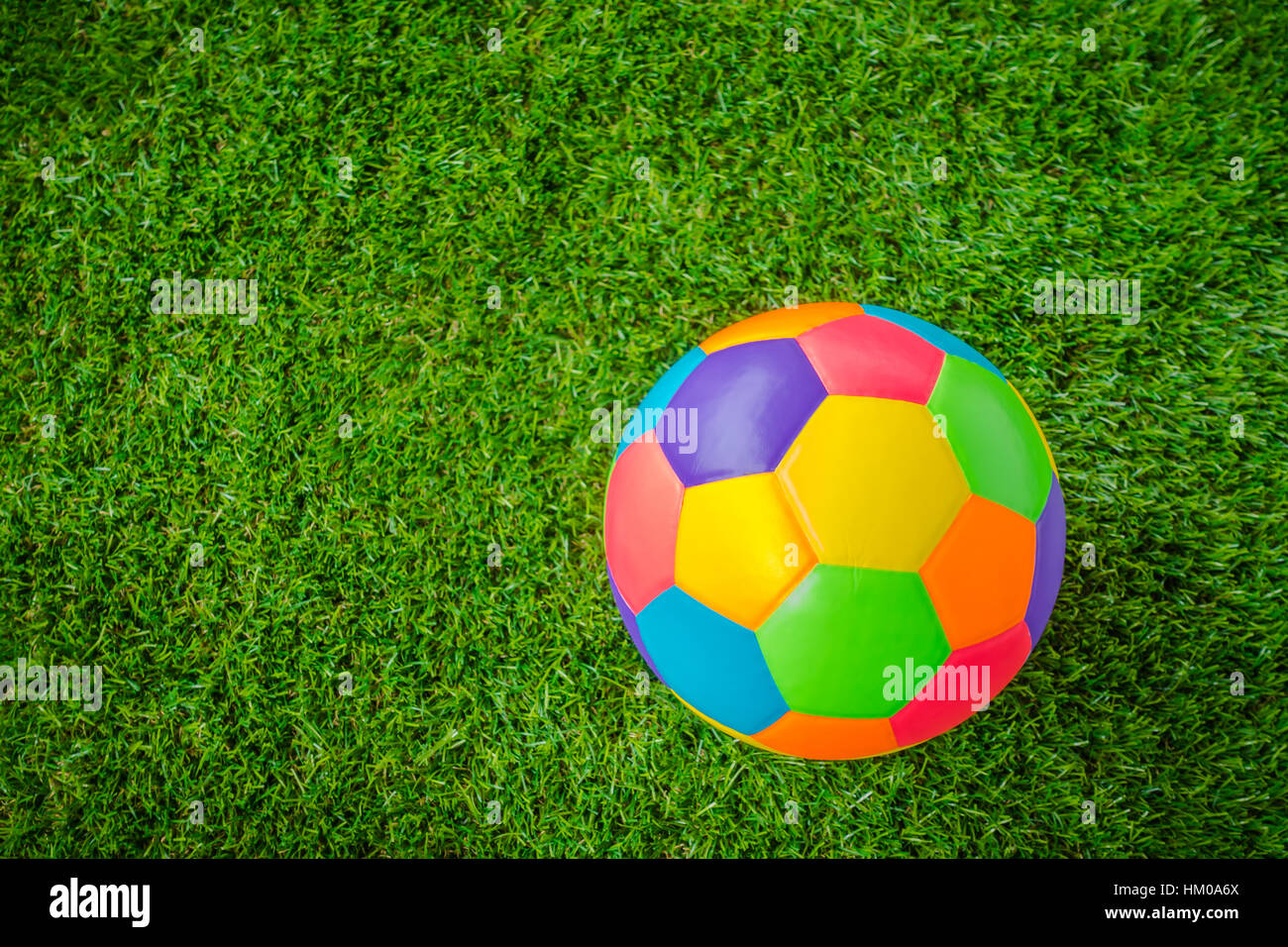Real leather Colorful multi colour Soccer ball on green grass Stock ...