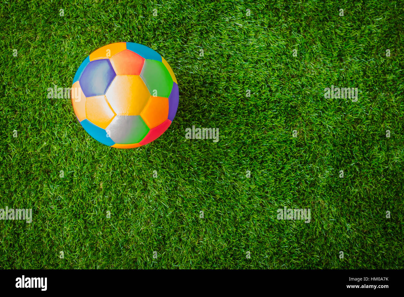 Real leather Colorful multi colour Soccer ball on green grass Stock ...