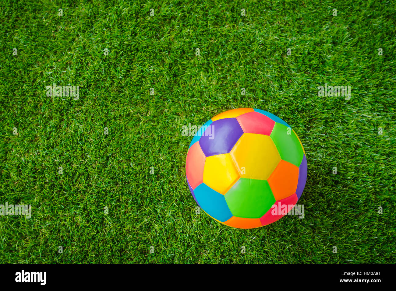 Real leather Colorful multi colour Soccer ball on green grass Stock ...