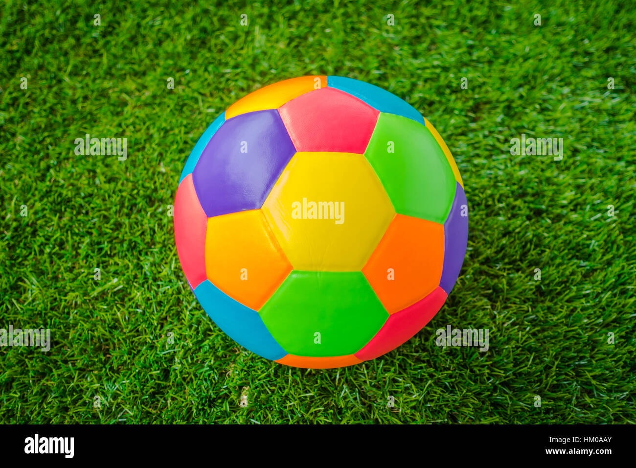 Real leather Colorful multi colour Soccer ball on green grass Stock ...