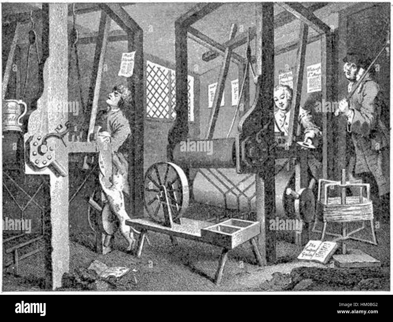 This image captures the process of hand-loom weaving, a traditional ...