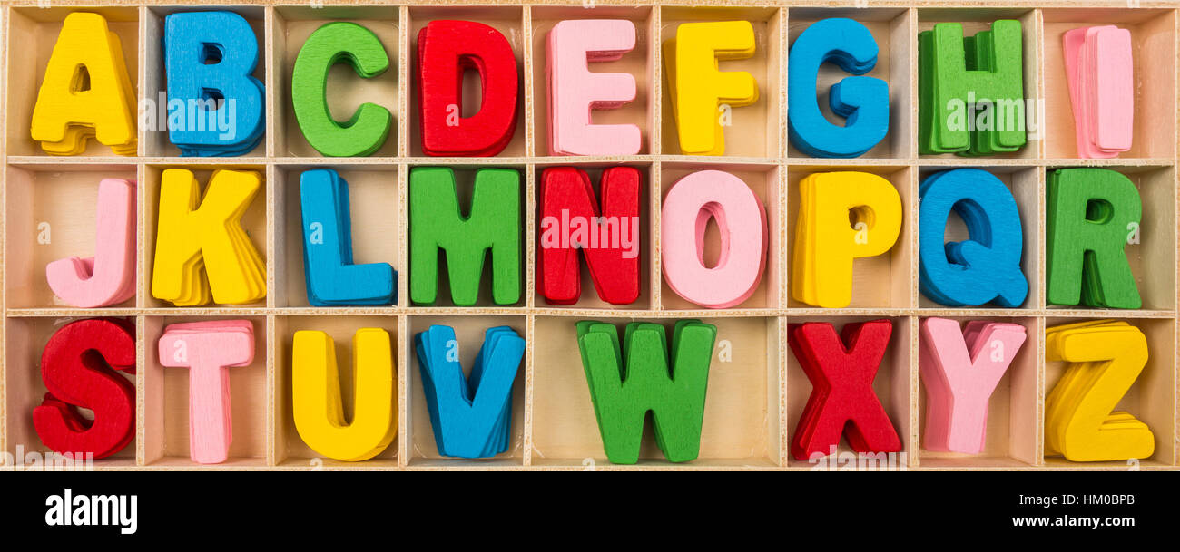 Colorful wooden alphabet letters set Stock Photo - Alamy