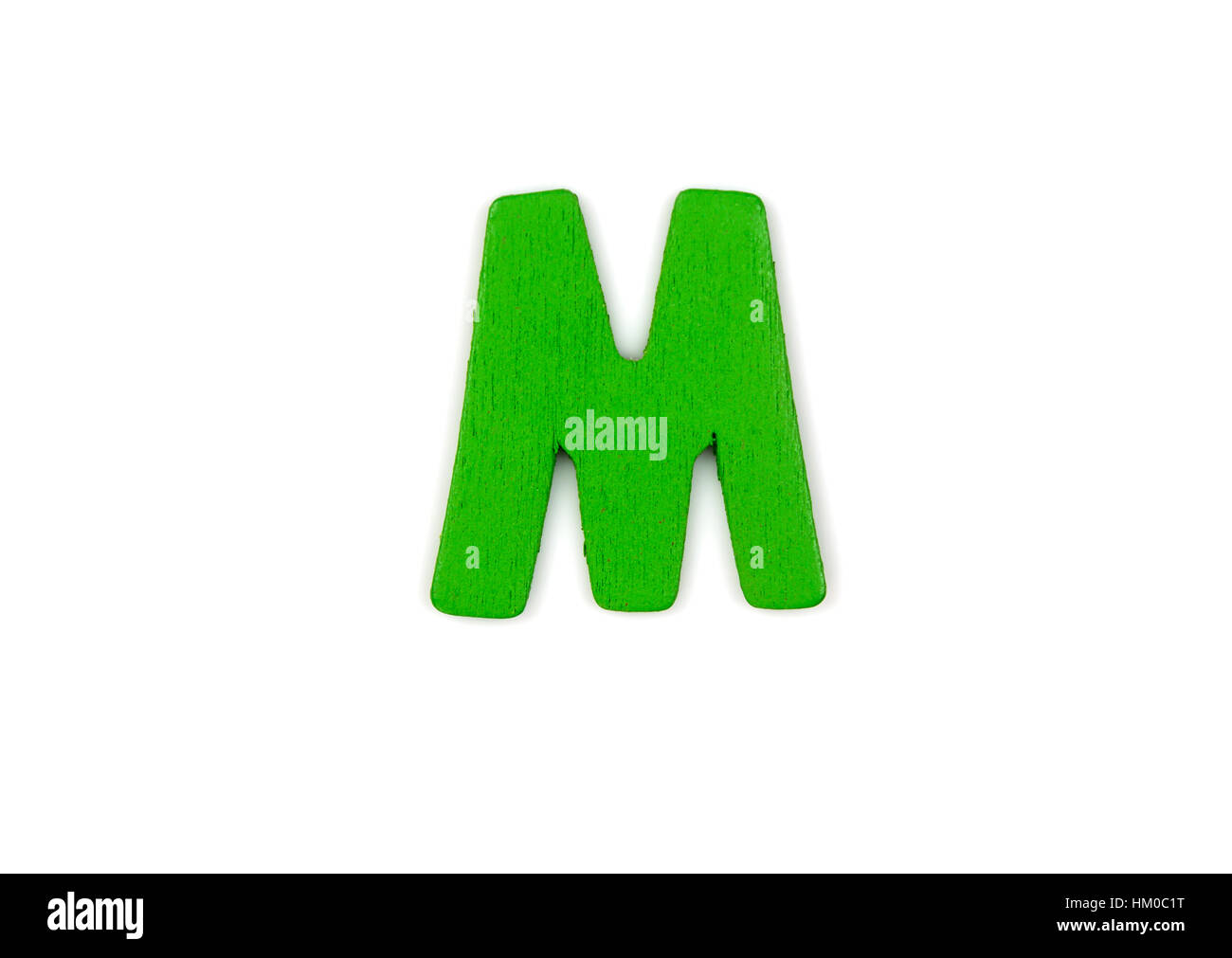 Colorful wooden alphabet letter on white background ,M Stock Photo - Alamy
