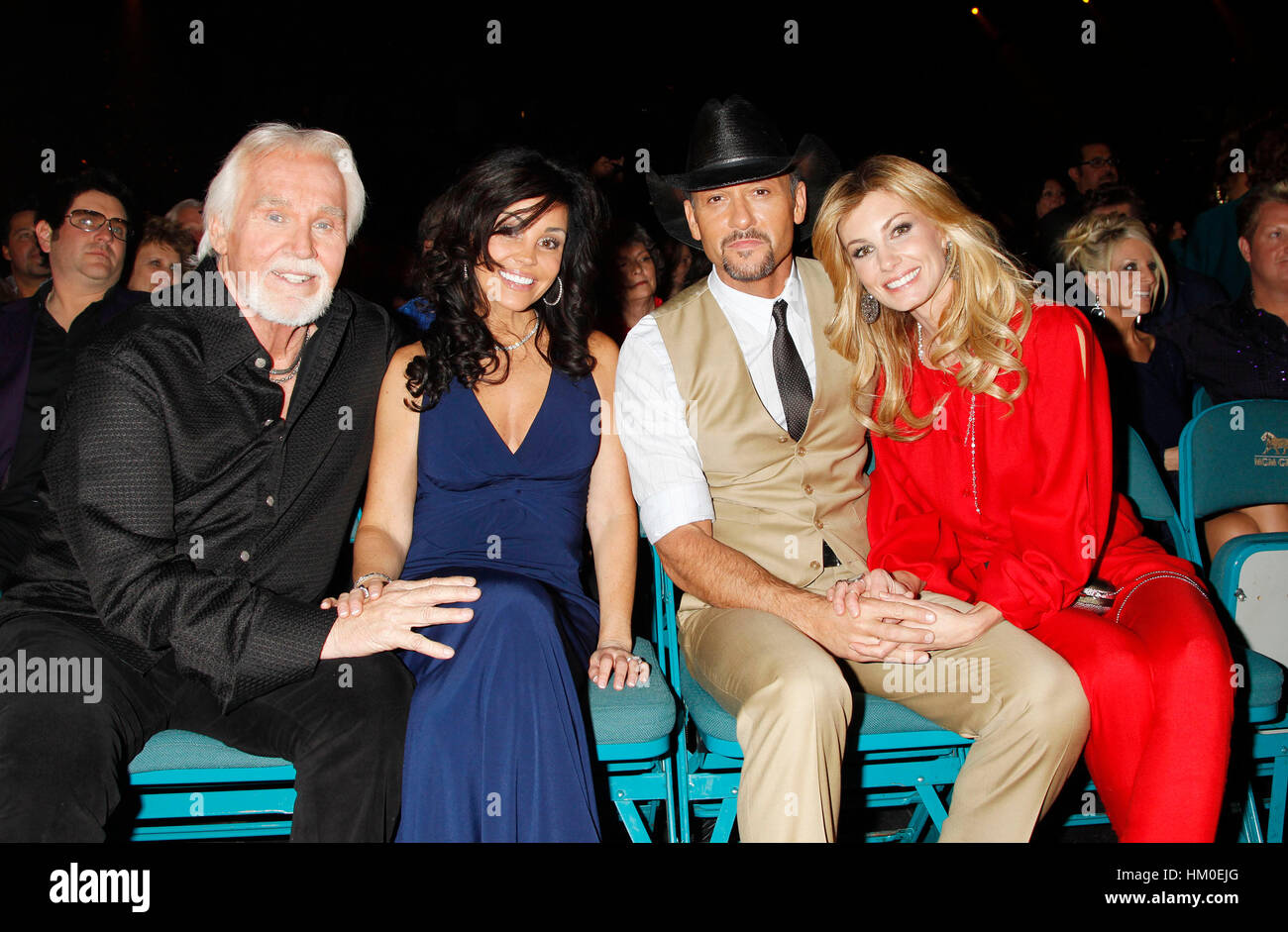 Kenny Rogers, his wife, Wanda Miller, with Tim McGraw and his wife ...