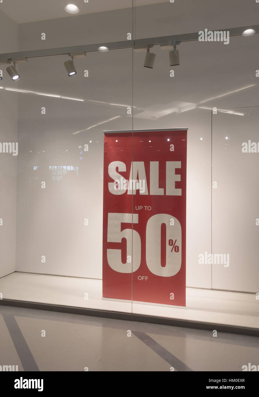 Red store discount sign on a shop window ( Filtered image processed ...