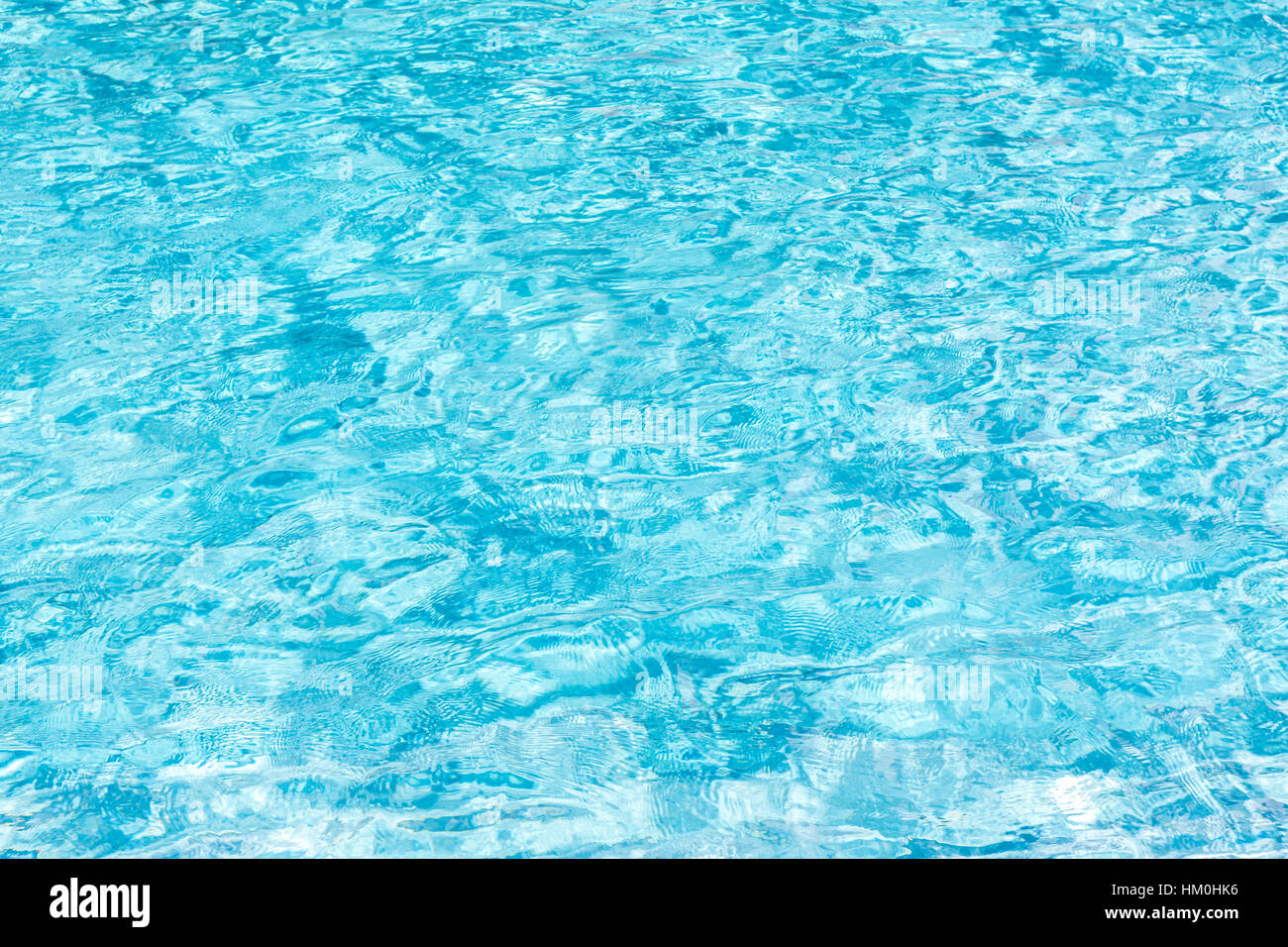Blue swimming pool rippled water Stock Photo - Alamy