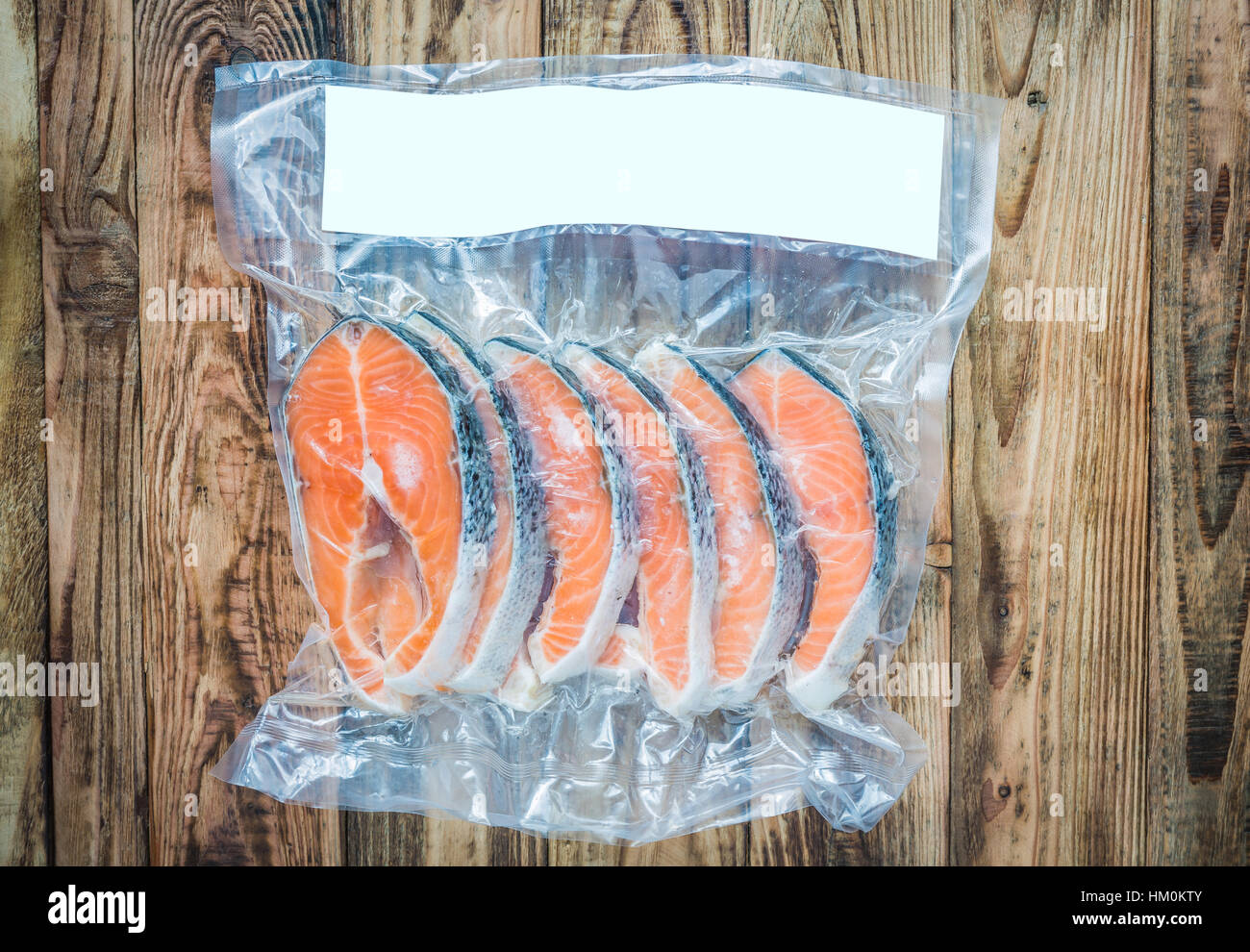 Frozen salmon fillets in a vacuum package Stock Photo - Alamy