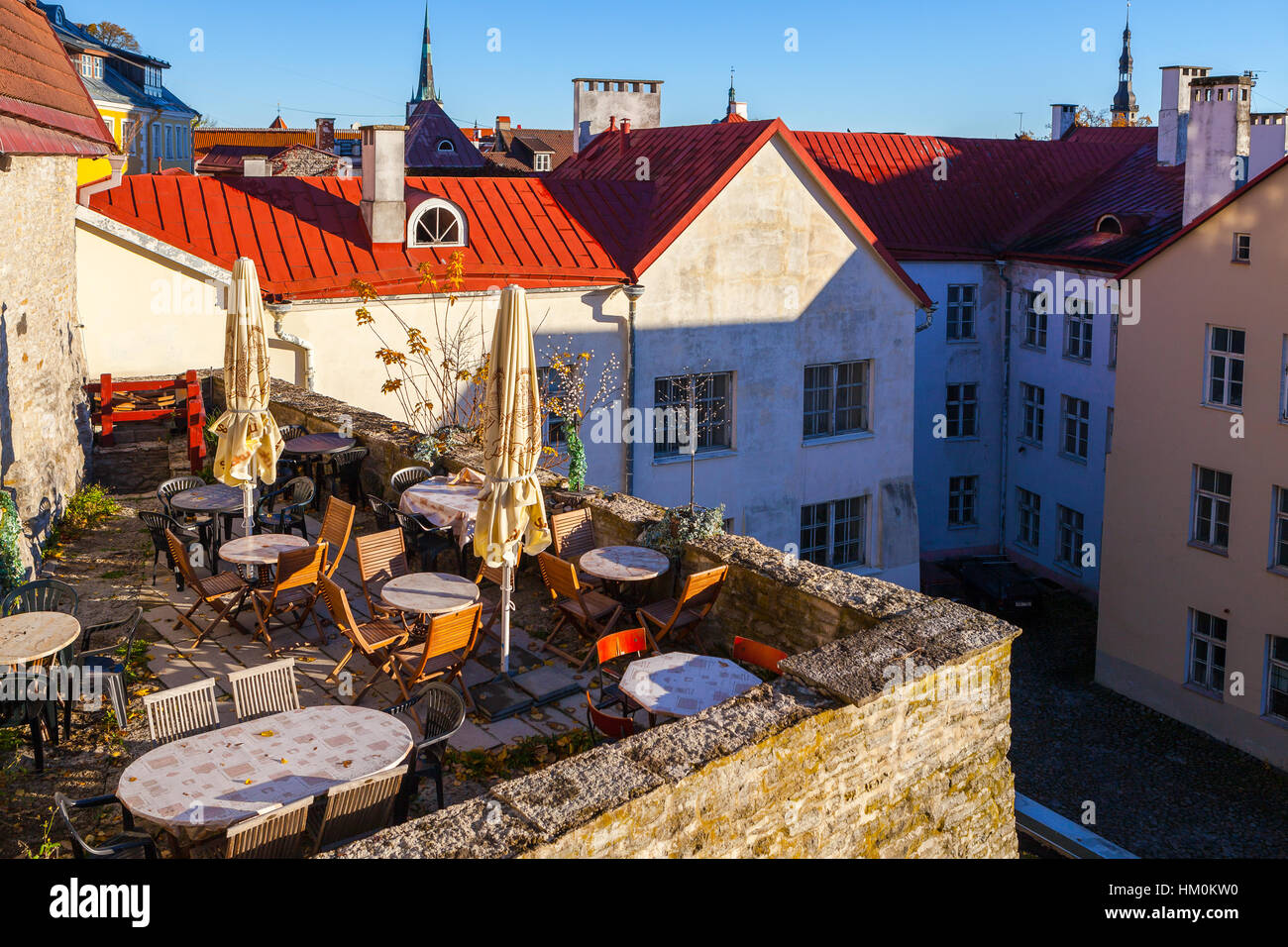 TALLINN, ESTONIA - 24 OKT 2015. Cosy cafe on medieval wall of old town ...
