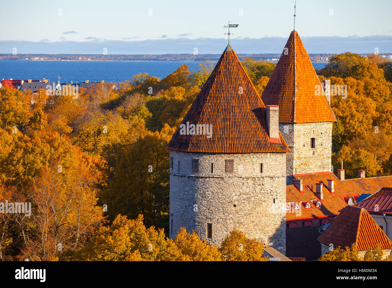 Medieval towers of old Tallinn at gold autumn season Stock Photo - Alamy