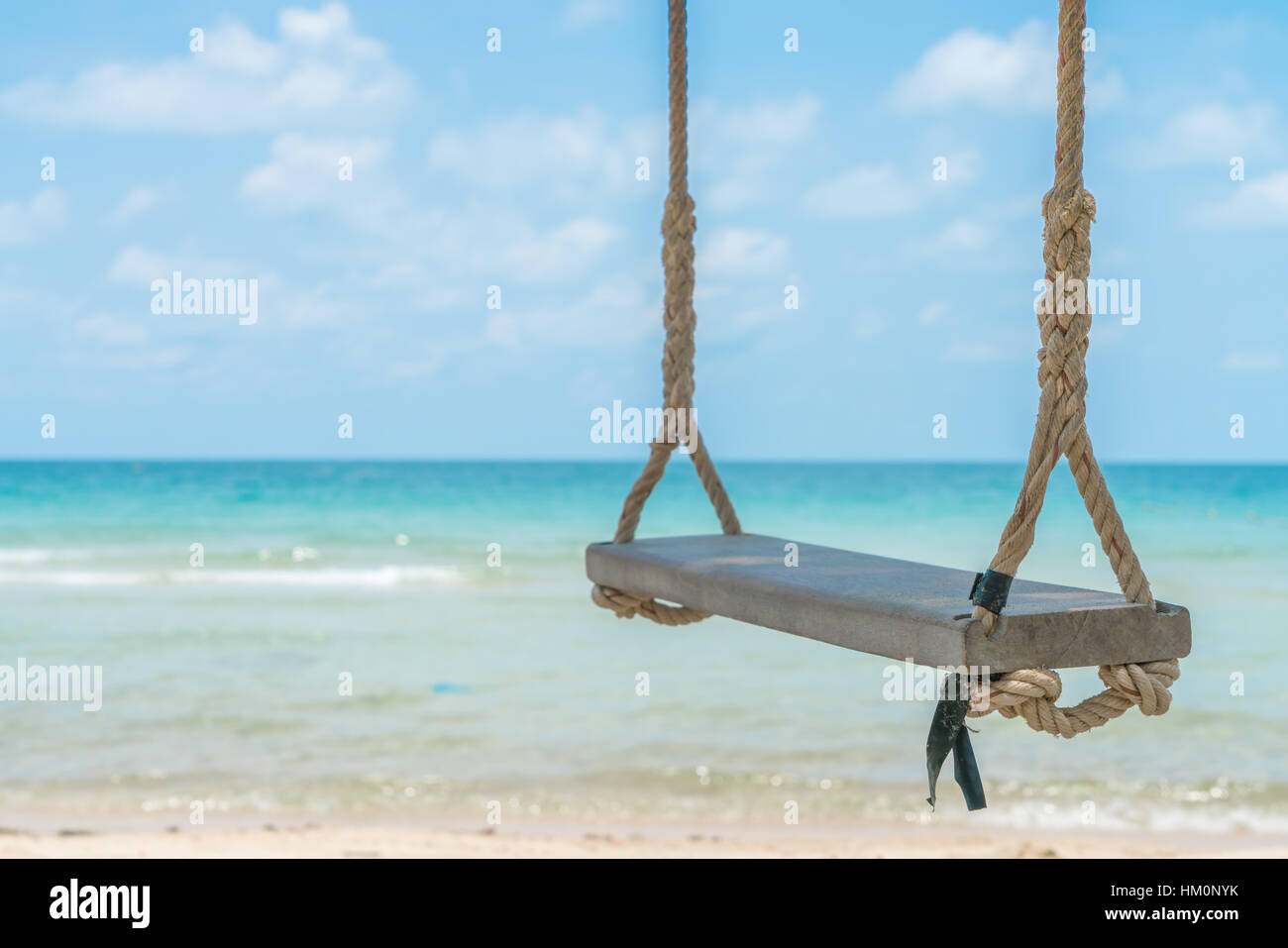 A swing on the beach Stock Photo - Alamy