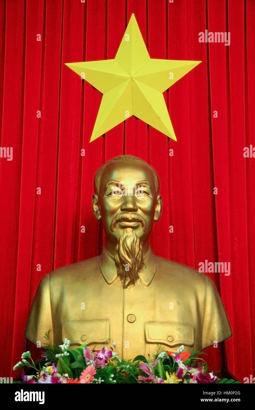 Bust of Ho Chi Minh in front of the Vietnamese flag in the Independence ...