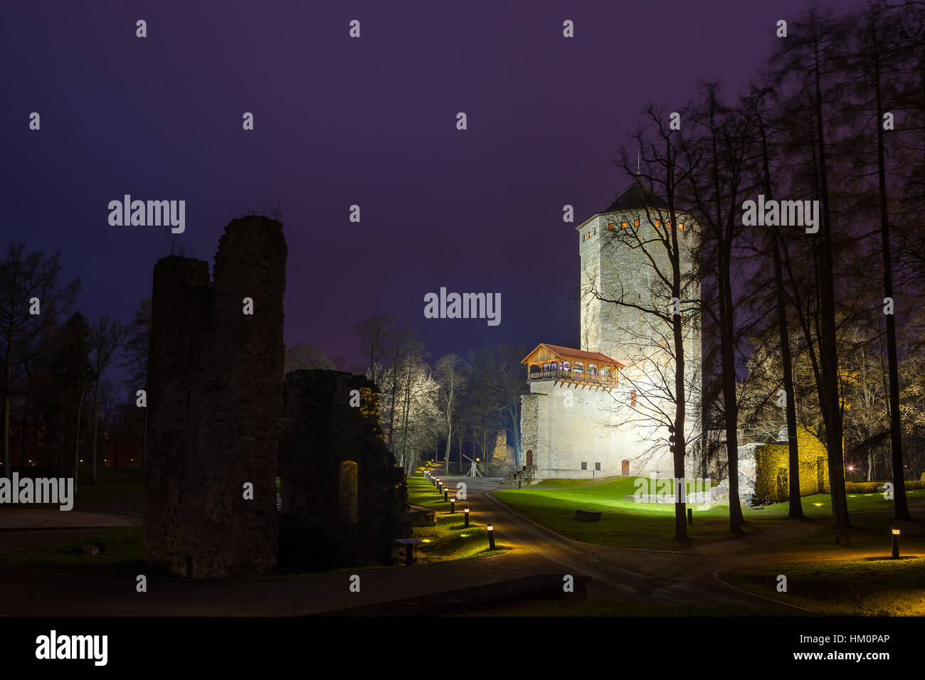 Keep - main tower of Paide castle in Estonia. Green park at ruins of ...