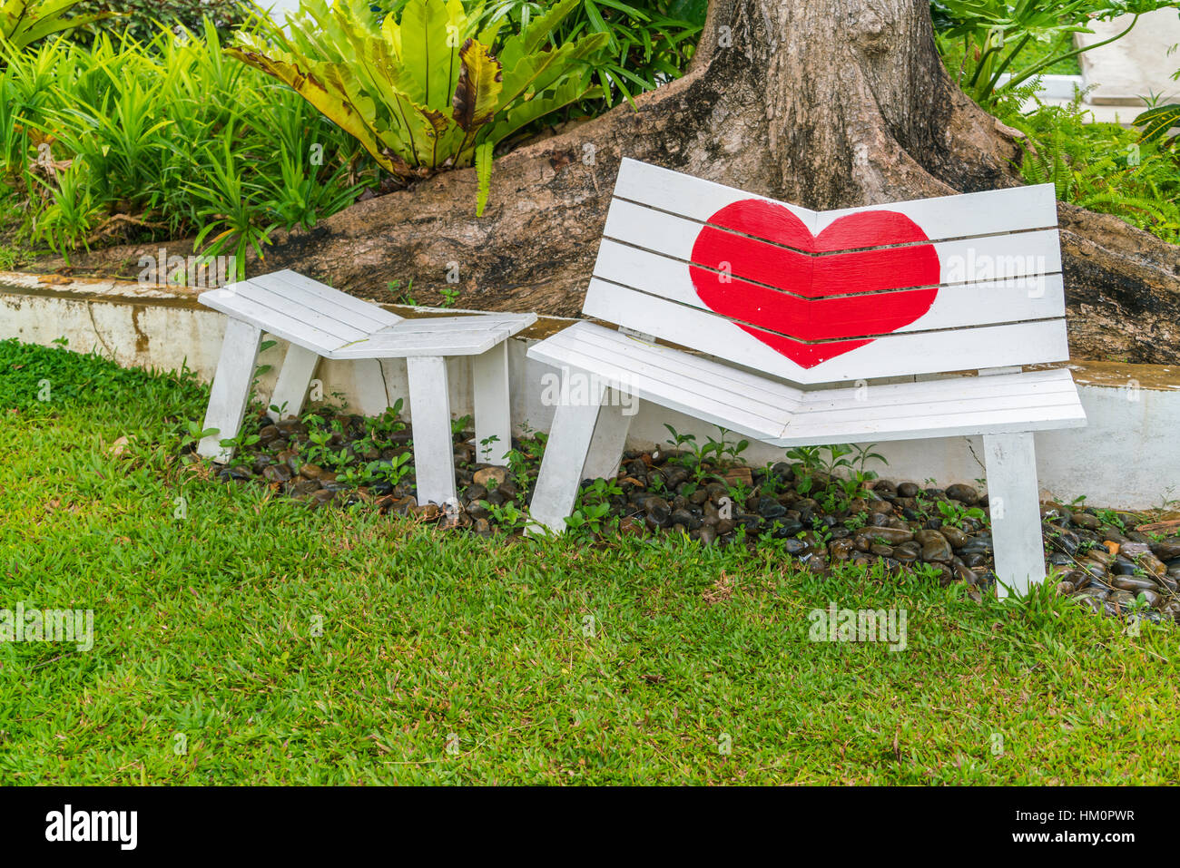 Chairs sitting on grass Stock Photo - Alamy
