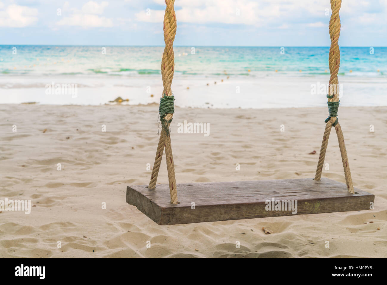 A swing on the beach Stock Photo - Alamy