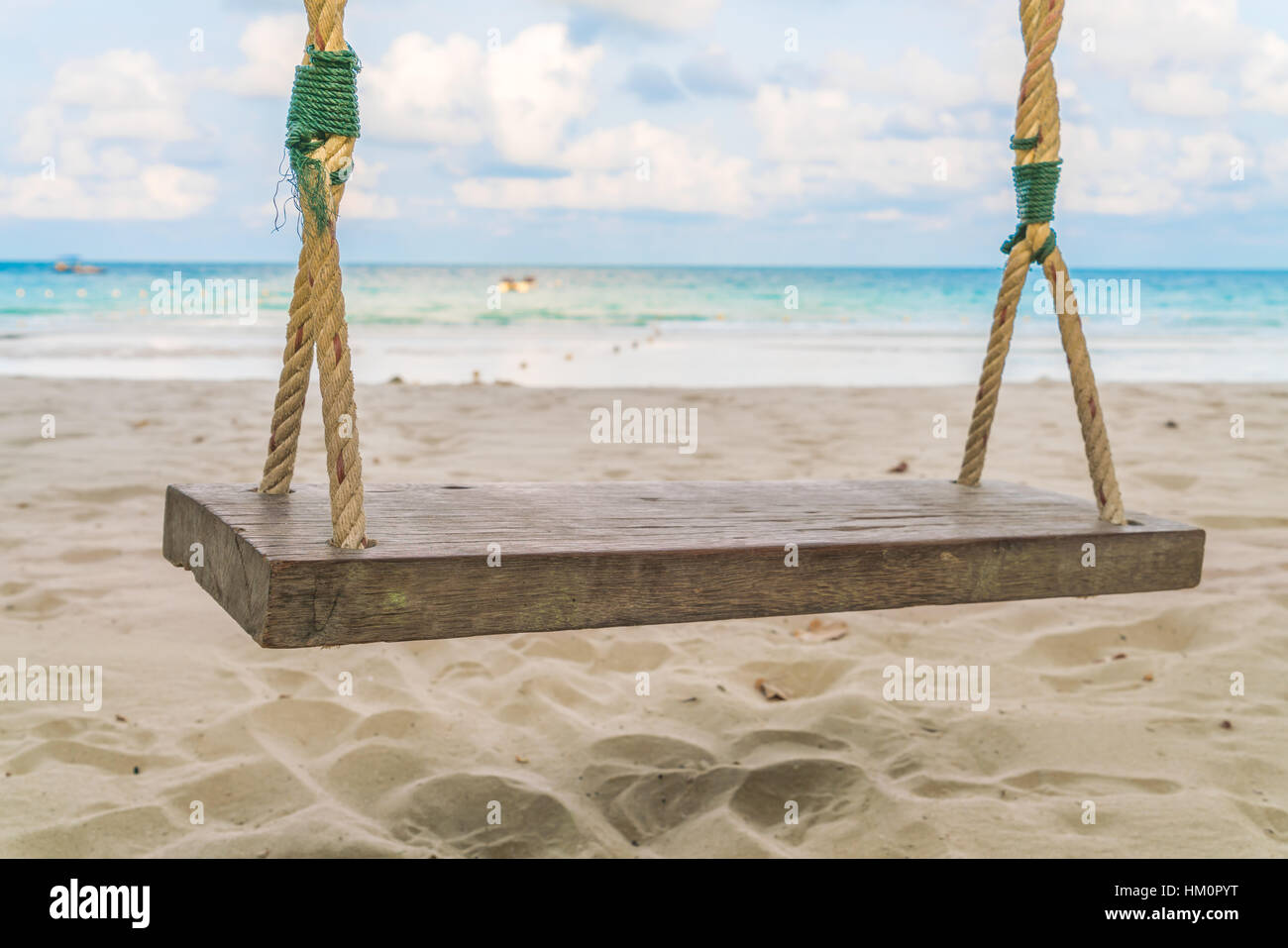 A swing on the beach Stock Photo - Alamy