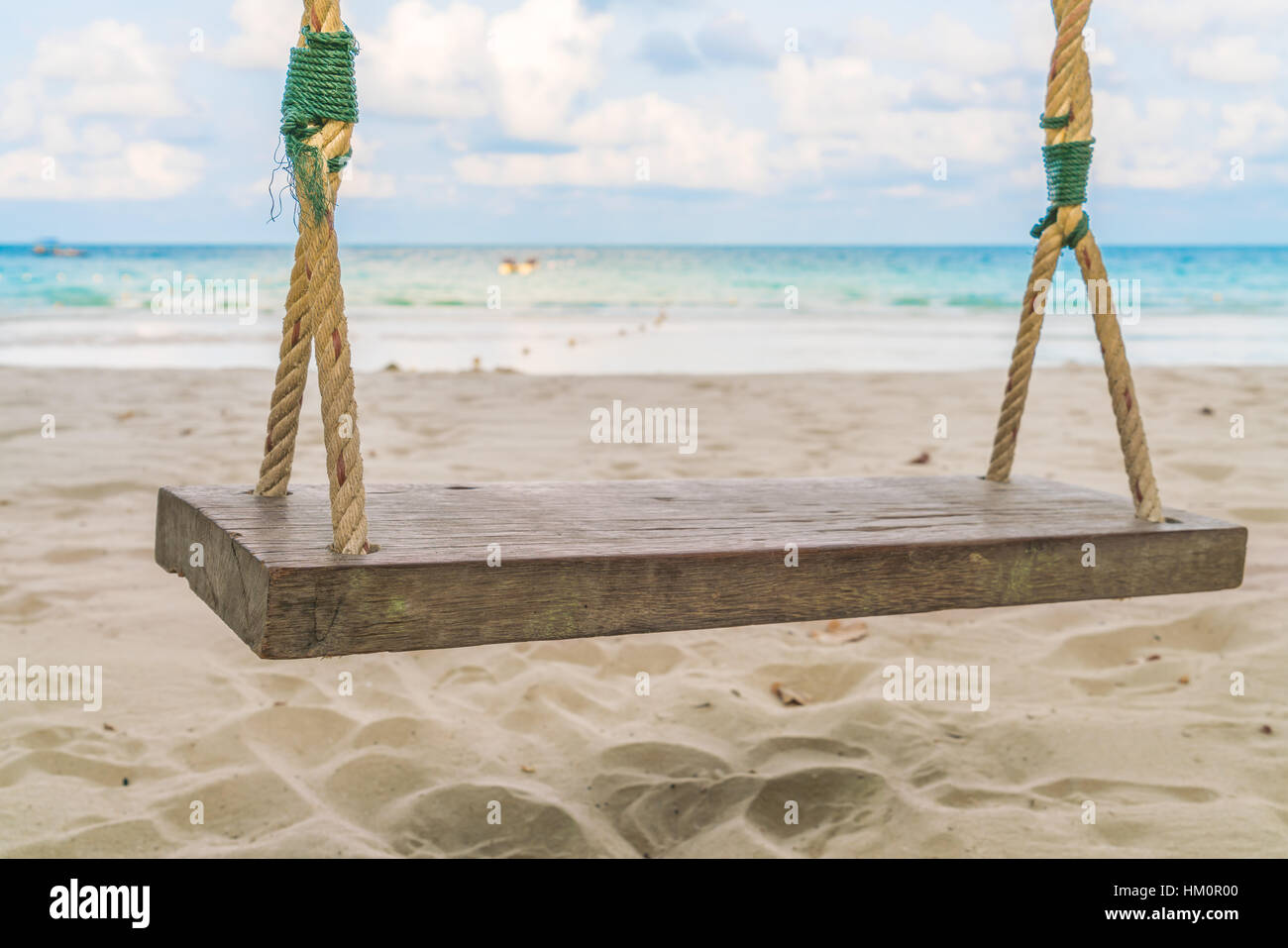 A swing on the beach Stock Photo - Alamy