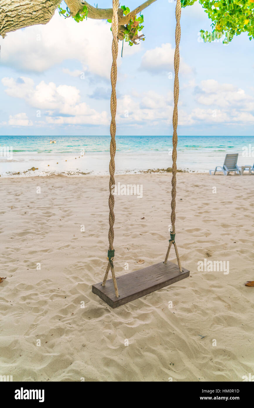 A swing on the beach Stock Photo - Alamy
