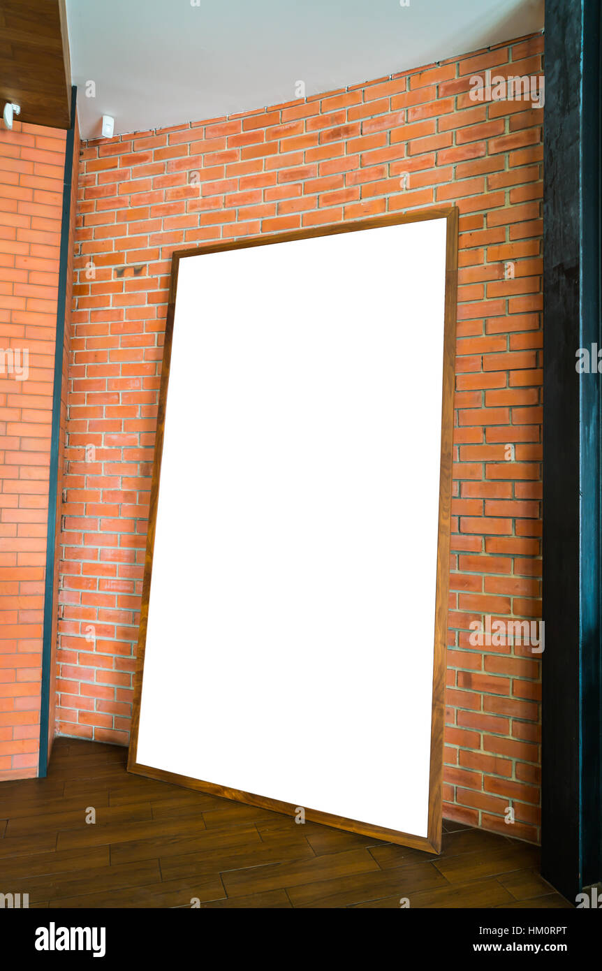 Blank wood sign on brick wall Stock Photo - Alamy