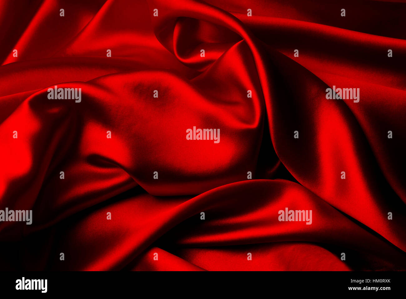 Closeup of ripples in red silk fabric Stock Photo - Alamy