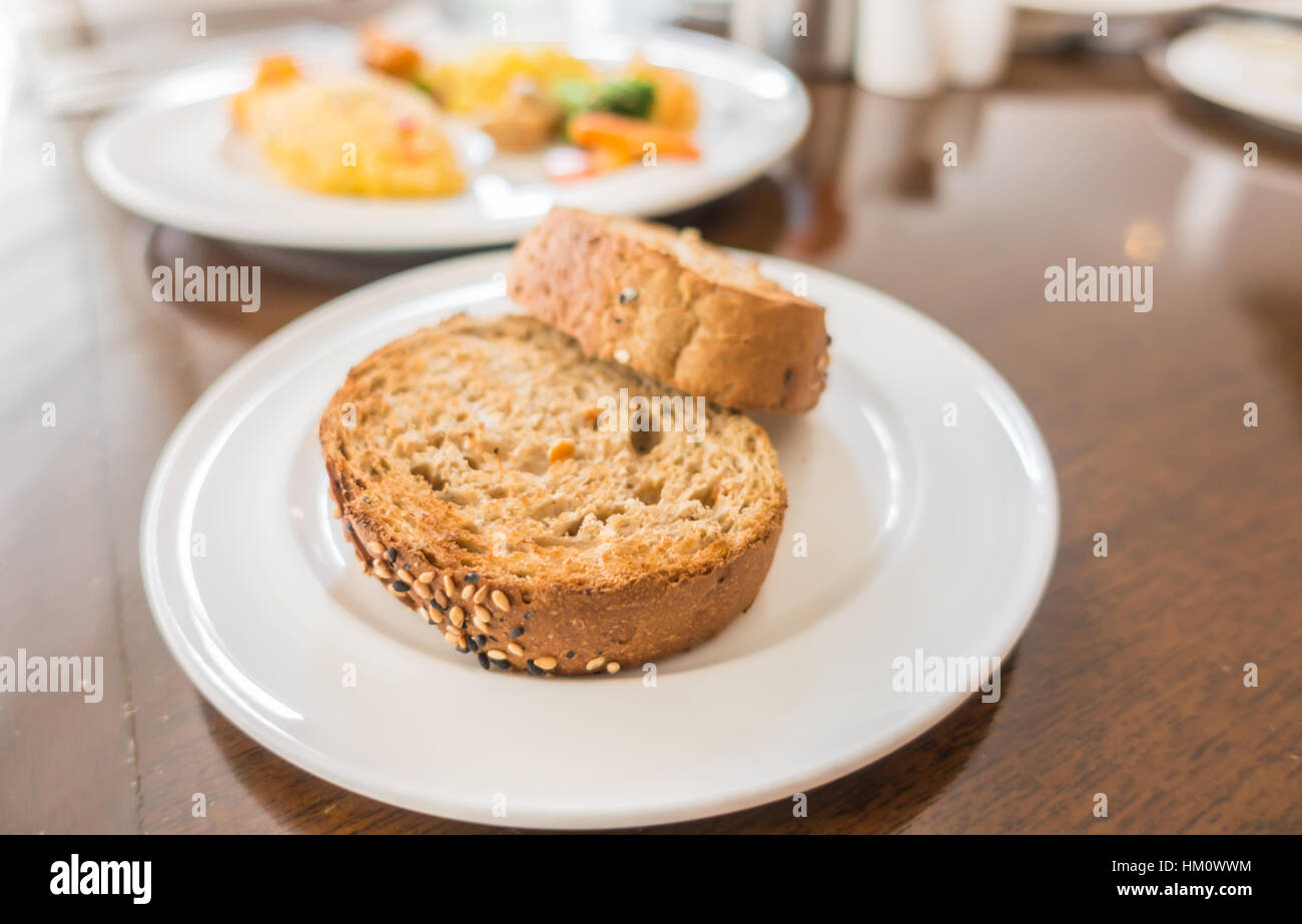 Toast bread in a white plate Stock Photo - Alamy