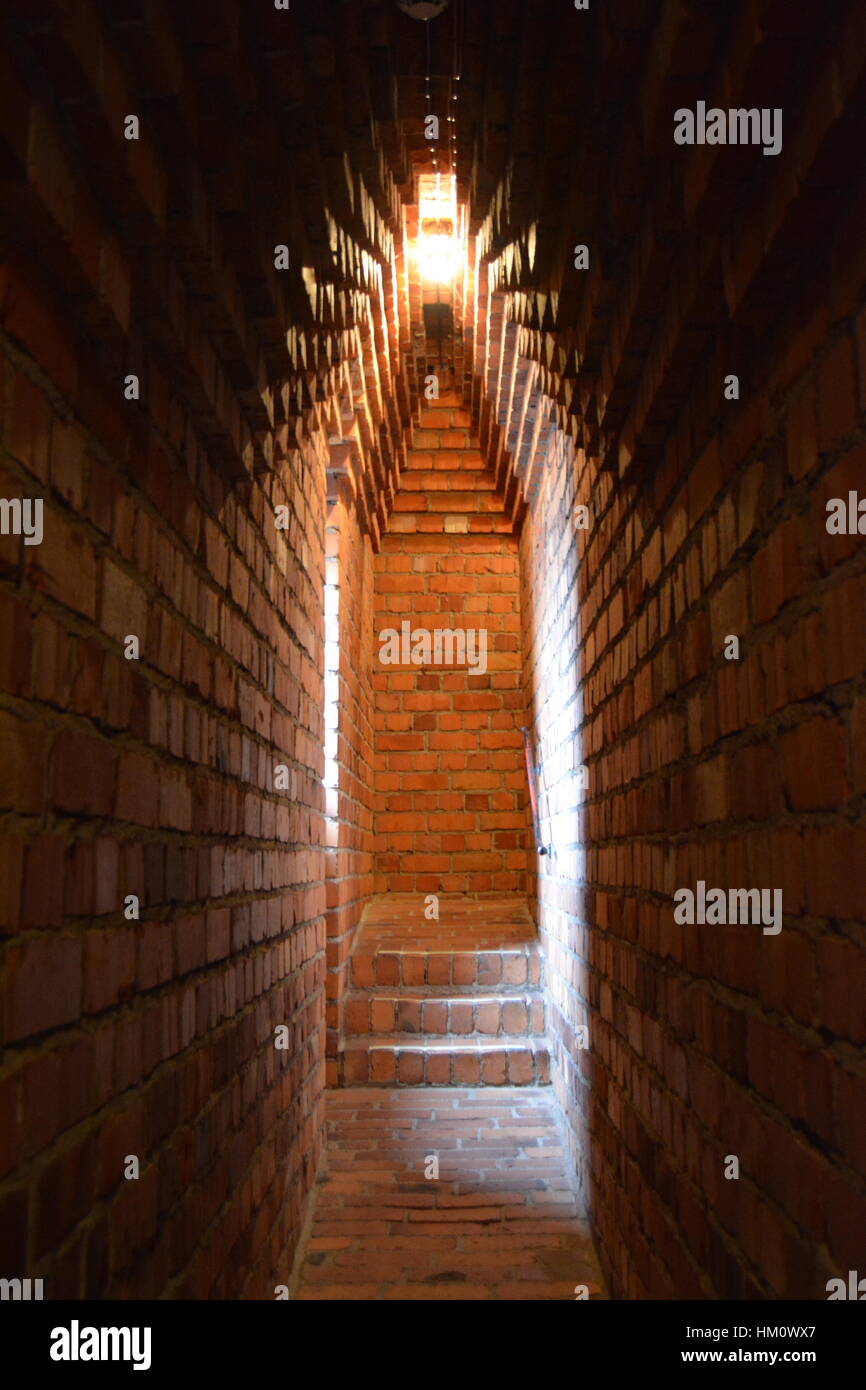 Narrow brick passage and stairway Stock Photo - Alamy