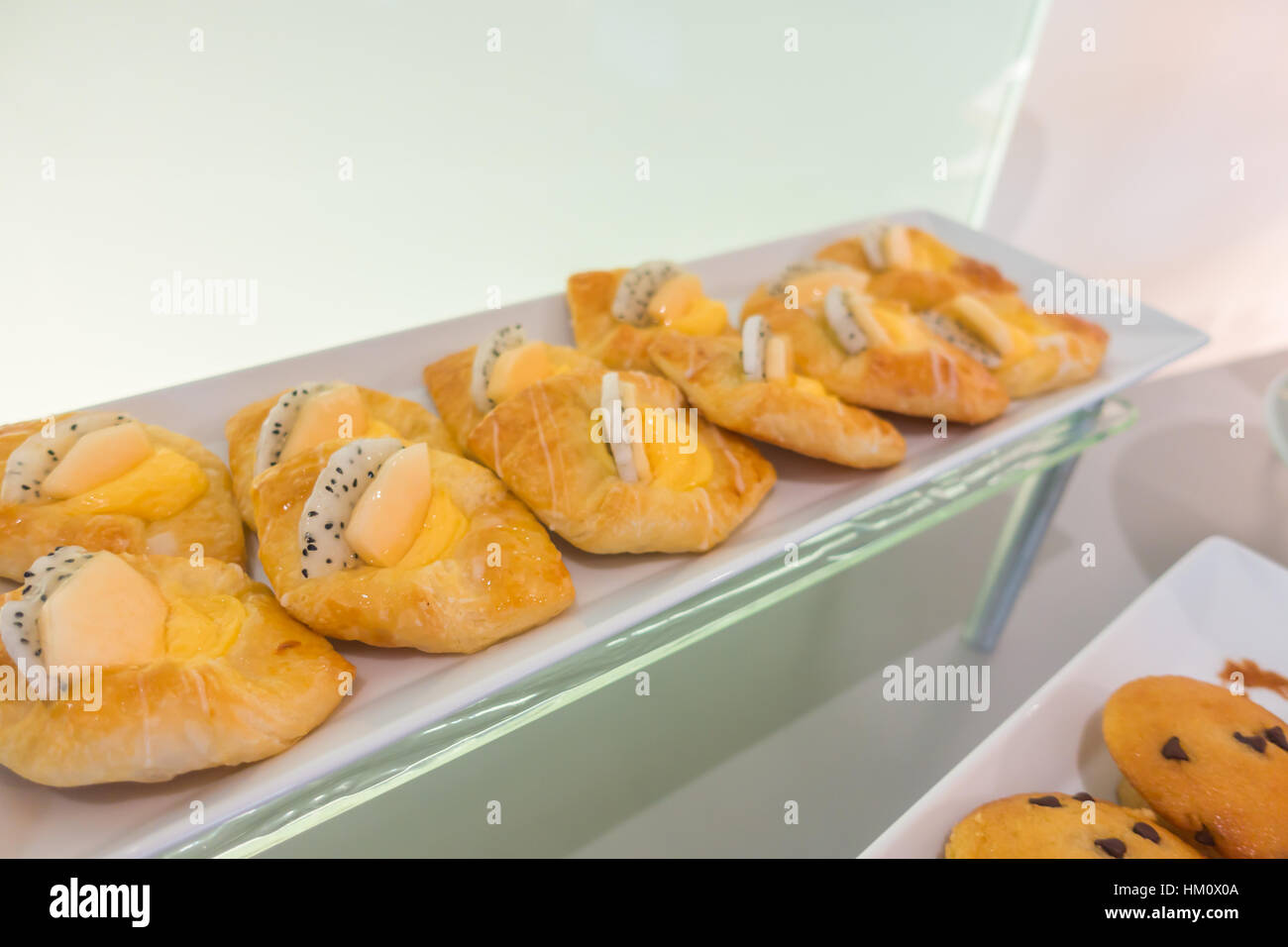 Assorted fruit cakes on table in buffet Stock Photo - Alamy