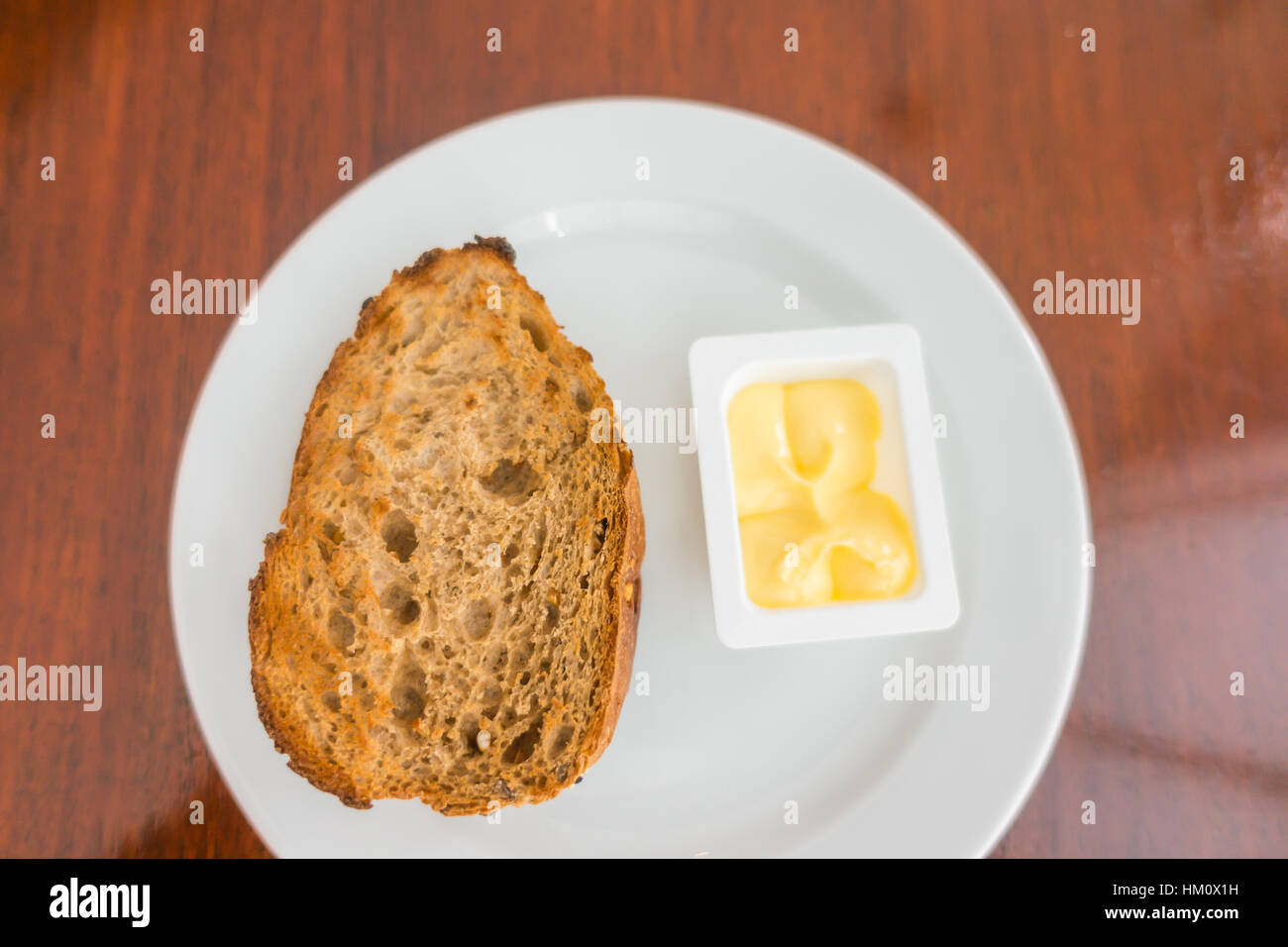Toast bread in a white plate Stock Photo - Alamy