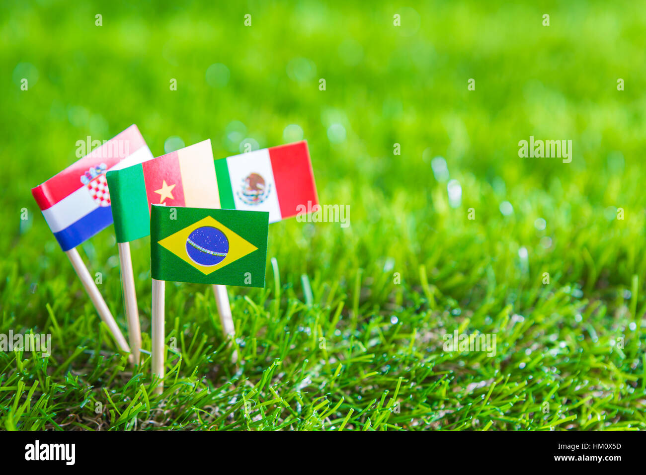 Paper cut of flags on grass for Soccer championship 2014 Stock Photo ...