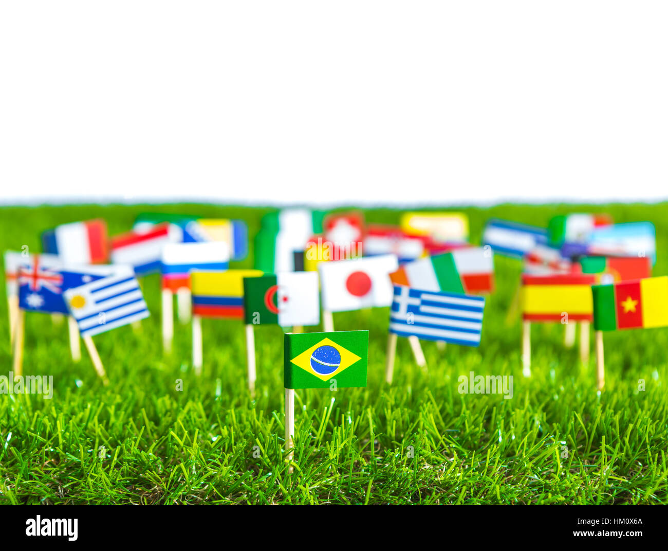 Paper cut of flags on grass for Soccer championship 2014 Stock Photo ...