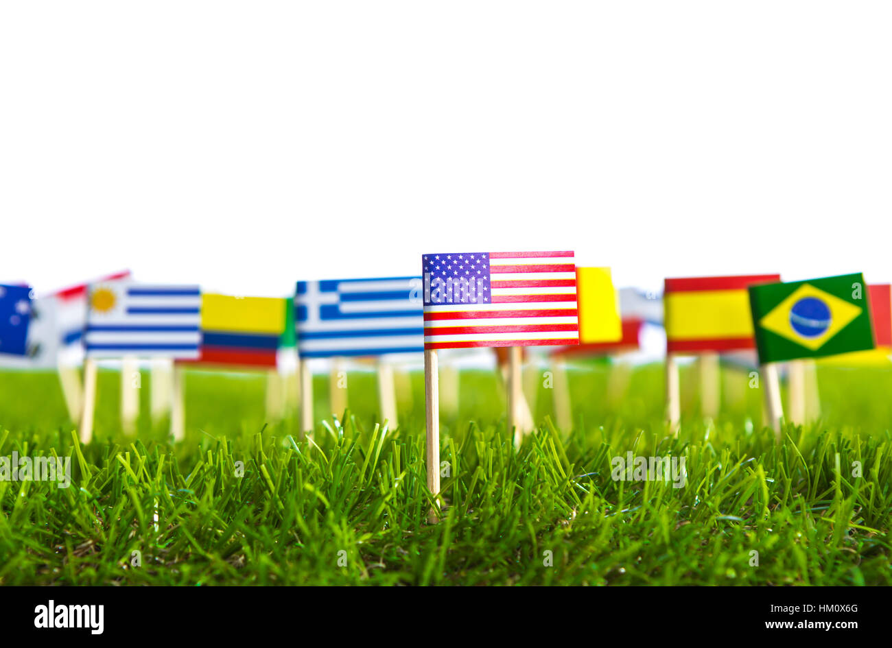 Paper cut of flags on grass for Soccer championship 2014 Stock Photo ...