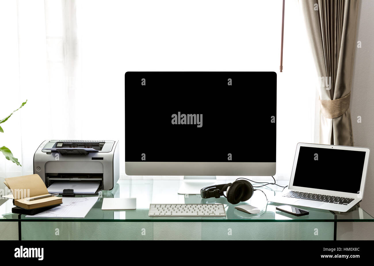 Modern home office with computer and labtop Stock Photo - Alamy