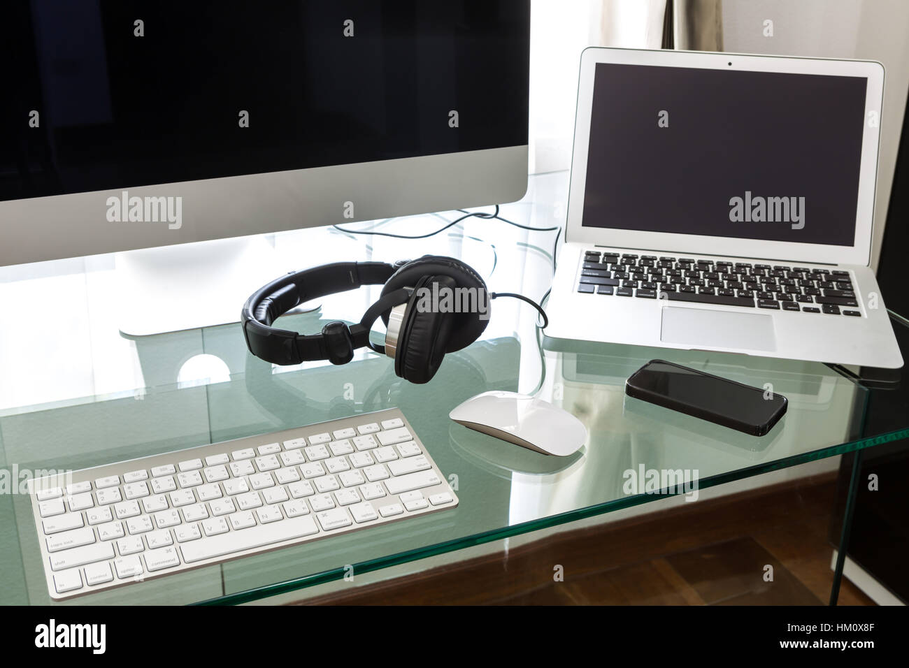 Modern home office with computer and labtop Stock Photo - Alamy