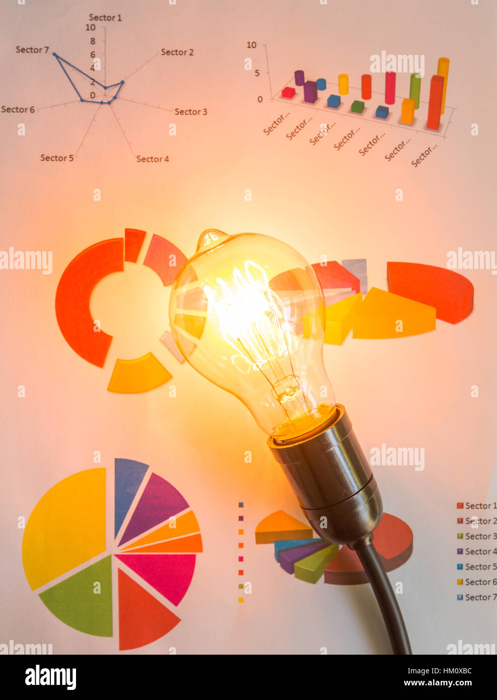 Light bulb with business graph Stock Photo - Alamy