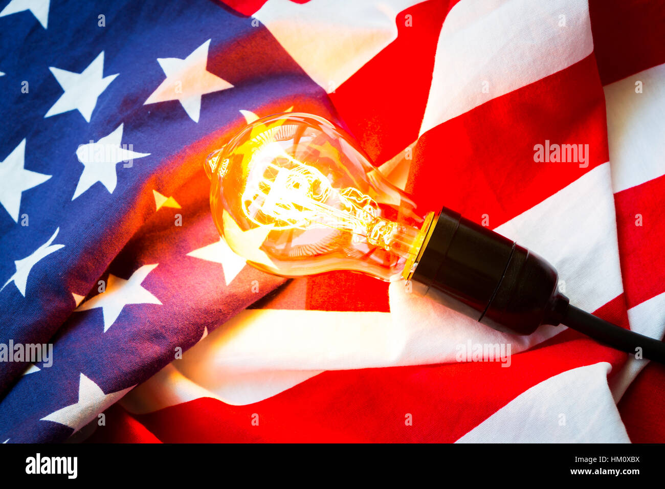 Light bulb on USA flag Stock Photo - Alamy