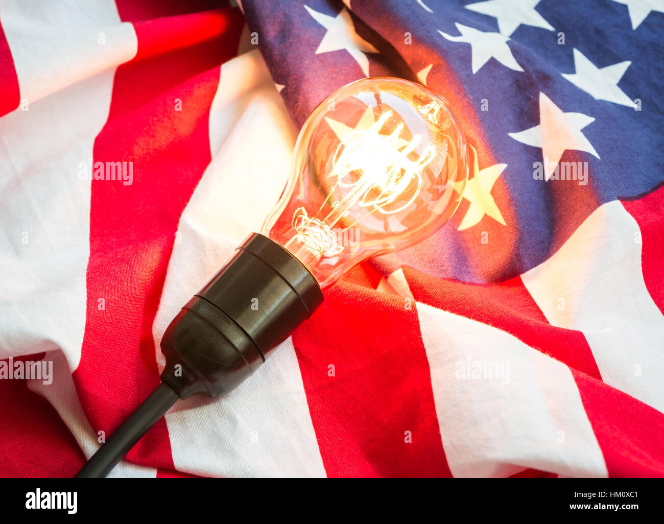 Light bulb on USA flag Stock Photo - Alamy