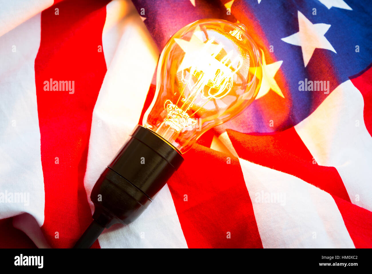 Light bulb on USA flag Stock Photo - Alamy