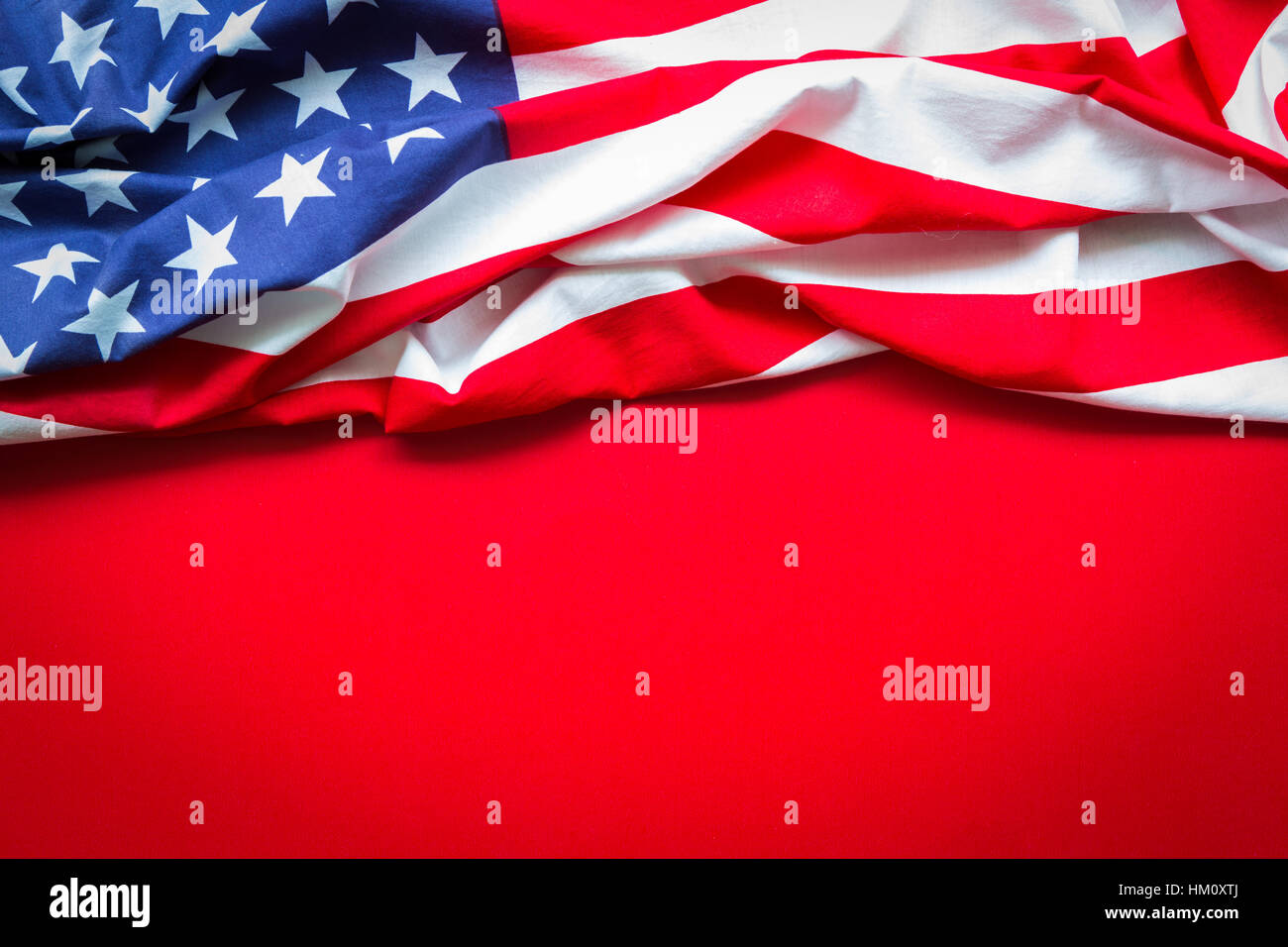 American flag on red background Stock Photo - Alamy