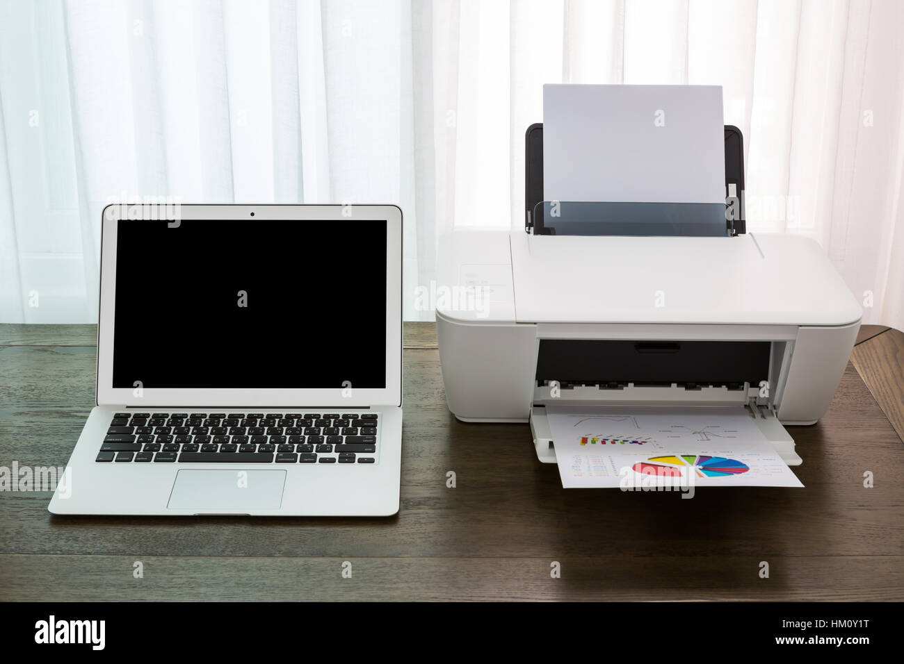 printer and Laptop on wood table Stock Photo - Alamy