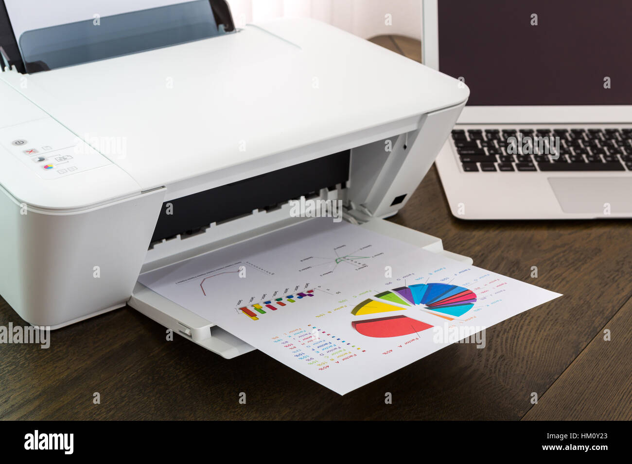 printer and Laptop on wood table Stock Photo - Alamy