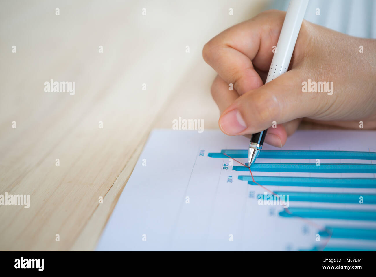 Hand write on Various financial charts on the table Stock Photo - Alamy