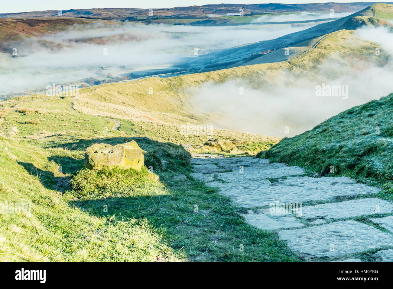 The stone path leading down from the peak of Mam Tor, Peak District ...