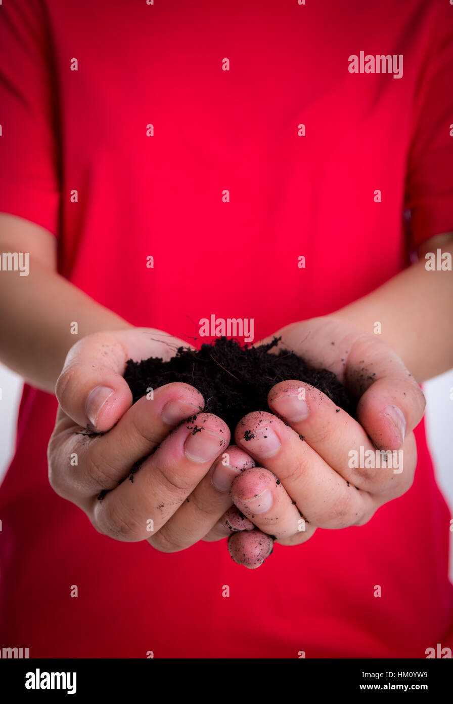 Hand holding soil Stock Photo - Alamy