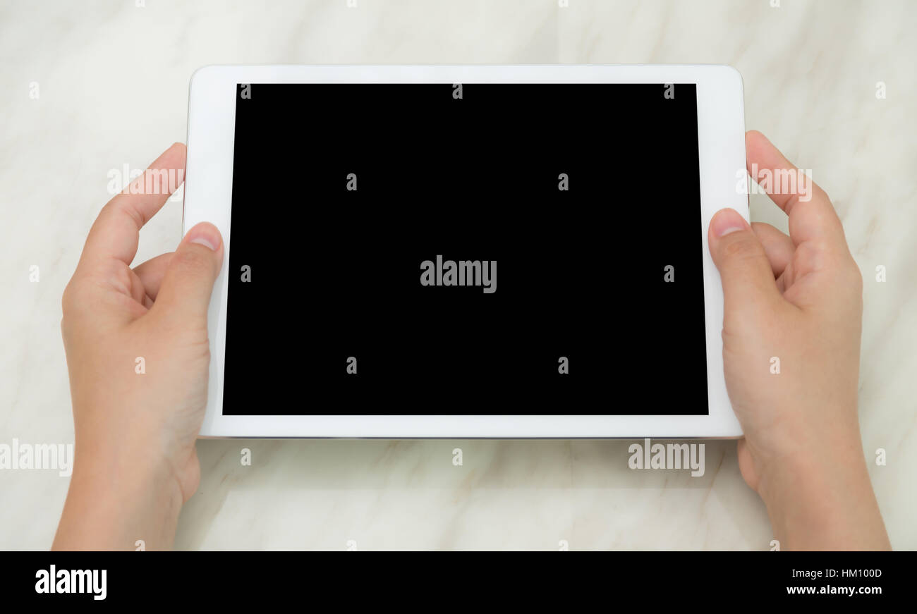 Woman hand hold white tablet with blank empty screen Stock Photo - Alamy