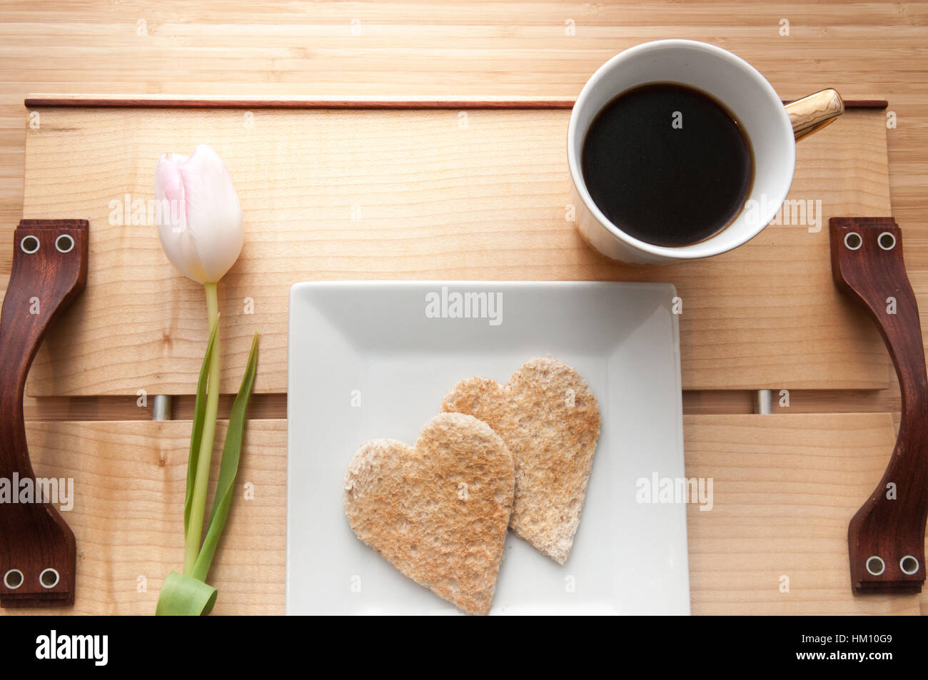 Romantic valentines day breakfast, love heart shape toast and coffee ...