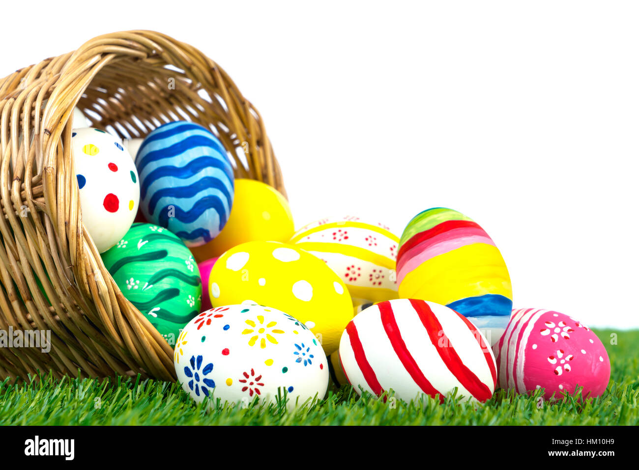 Easter Eggs on Fresh Green Grass over white background Stock Photo - Alamy