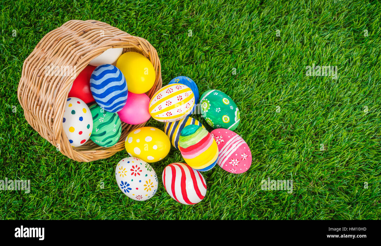 Basket of easter eggs on Fresh Green Grass Stock Photo - Alamy