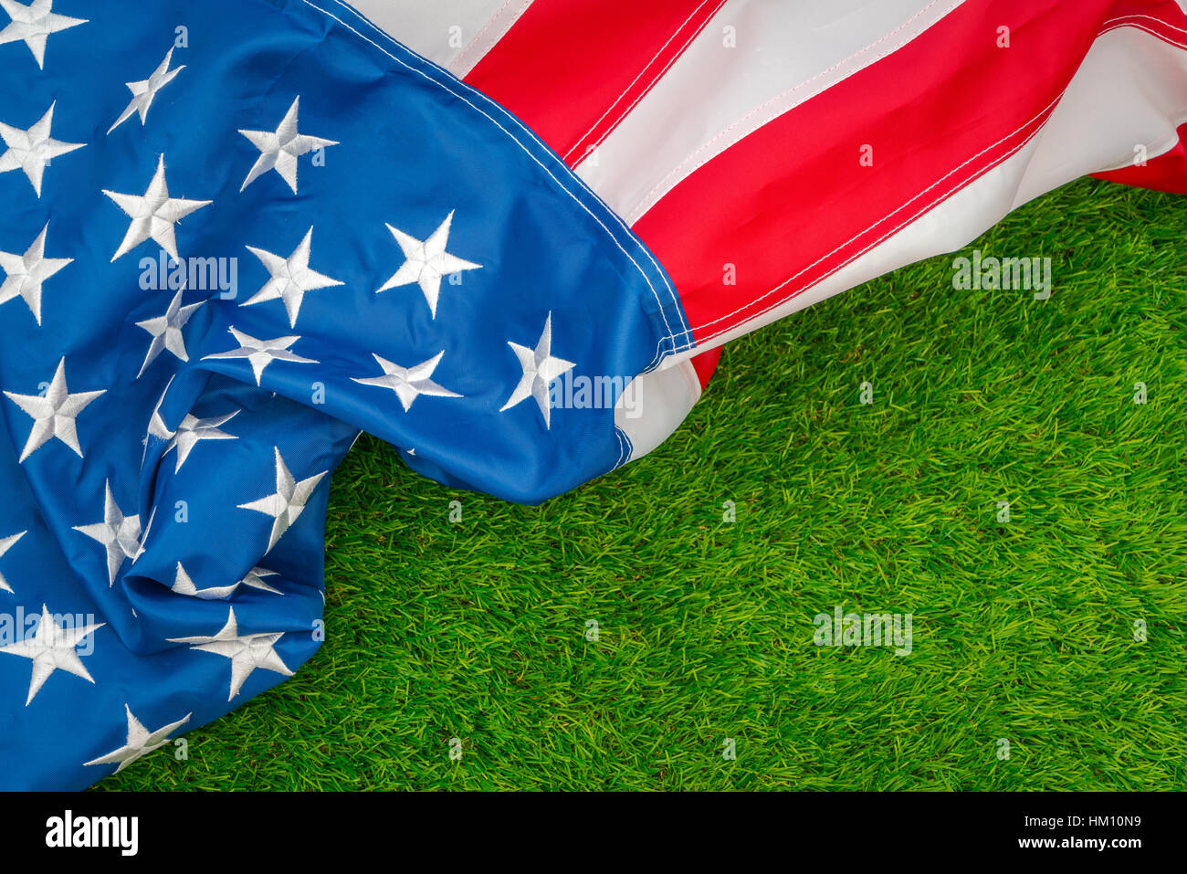American flag on green grass Stock Photo - Alamy