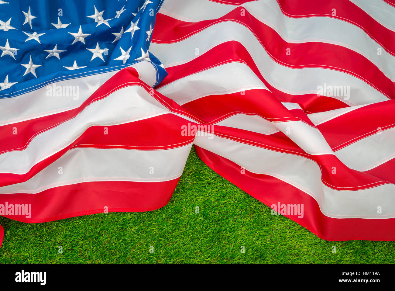 American flag on green grass Stock Photo - Alamy