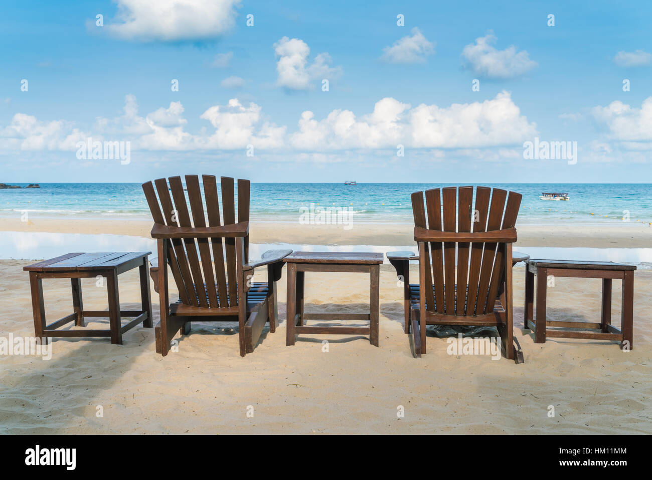 Beautiful beach chairs on tropical white sand beach Stock Photo - Alamy