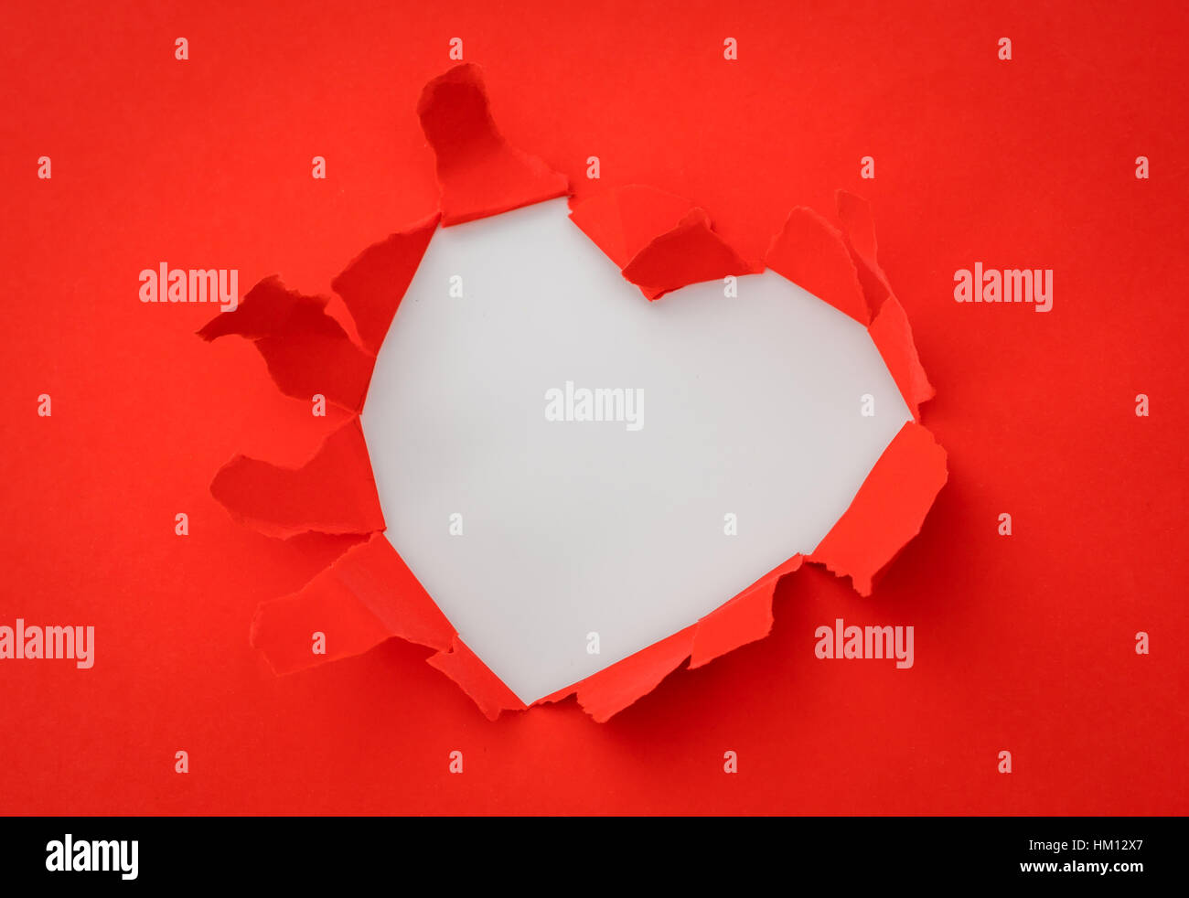 Red crumpled torn paper heart hi-res stock photography and images - Alamy